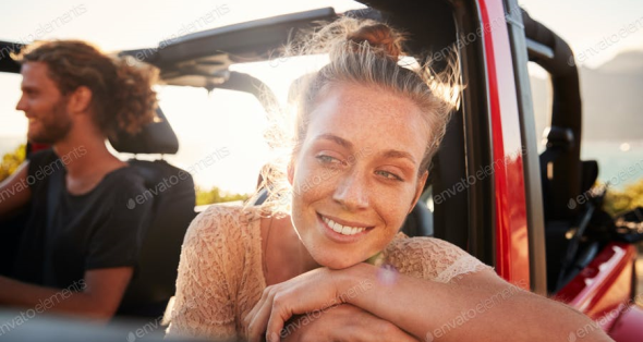 عکس ماشین سواری در جاده 37256 Couple On A Road Trip Driving In Open Top Car مزرعه فوتیج