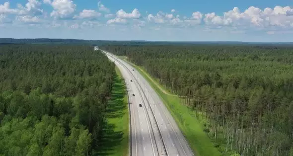 فوتیج جاده جنگلی 33620 Aerial Top View On Country Road In Forest مزرعه فوتیج