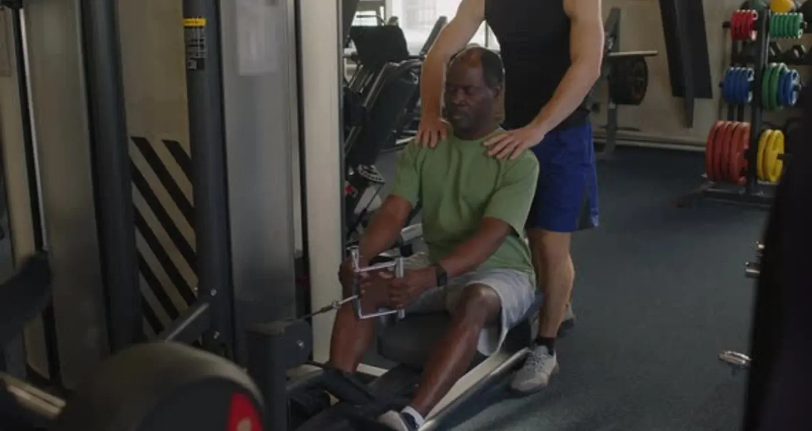 فوتیج مربی در حال آموزش بدنسازی در باشگاه 34848 Man Pulling Weight With ...